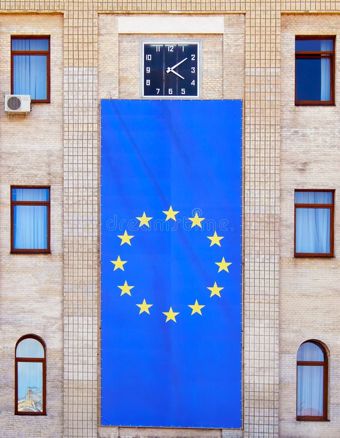 Flag of the European Union on the Building with a Clock Stock Photo ...