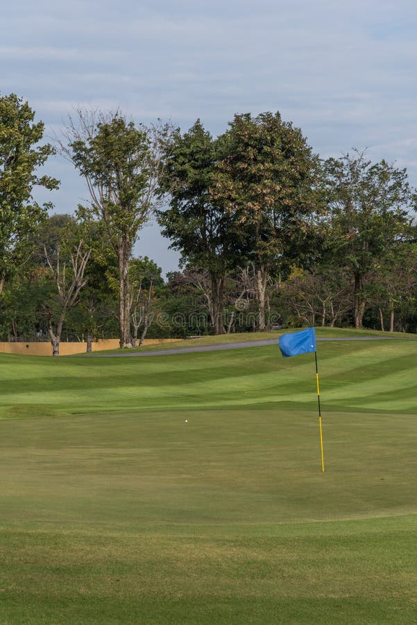 Flag at golf course stock photo. Image of game, fairway - 106498474