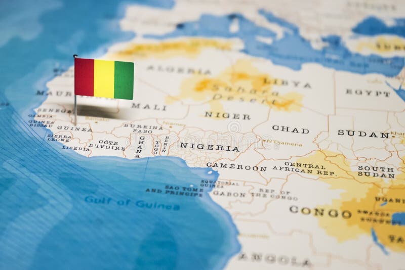 The Flag of Guinea in the World Map Stock Photo - Image of education ...