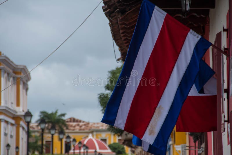 Costa Rican Flag in the Street Stock Image - Image of cultures, people ...
