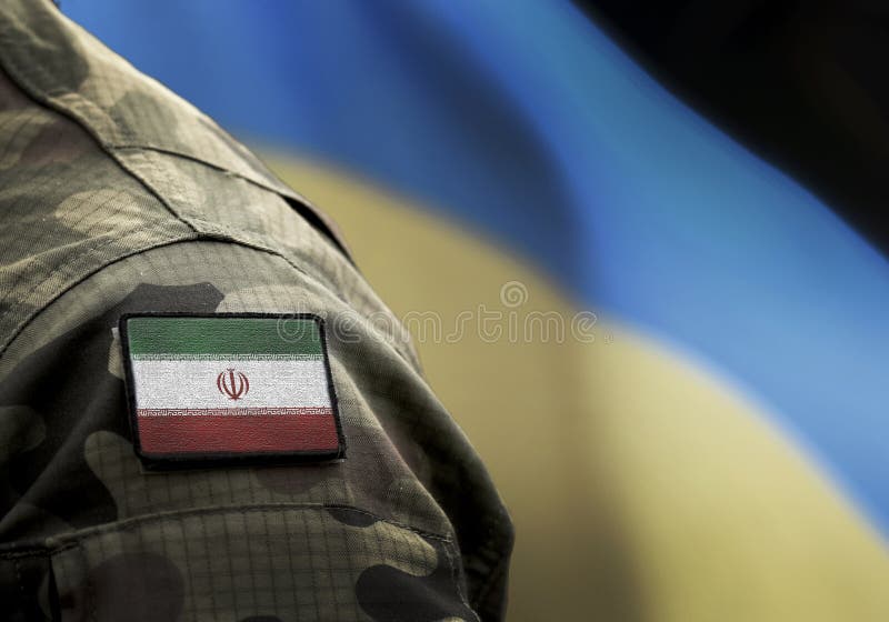 Flag of Iran on Military Uniform and Flag of the Ukraine at Background ...