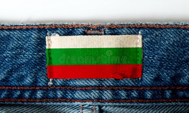 Flag on the label of jeans stock photo. Image of fashion - 230776948