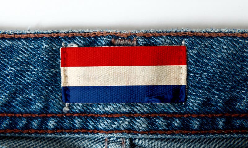 Flag on the label of jeans stock photo. Image of jeans - 230777344