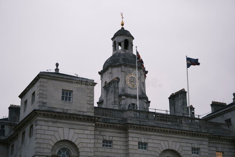 Flag on the Monument Building with a Wall Clock Stock Photo - Image of ...