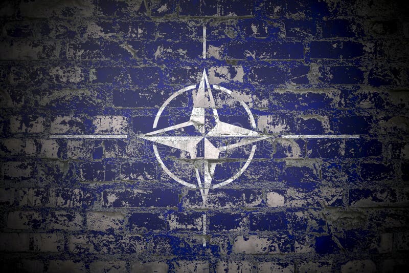 Flag of NATO on brick wall editorial stock photo. Illustration of ...