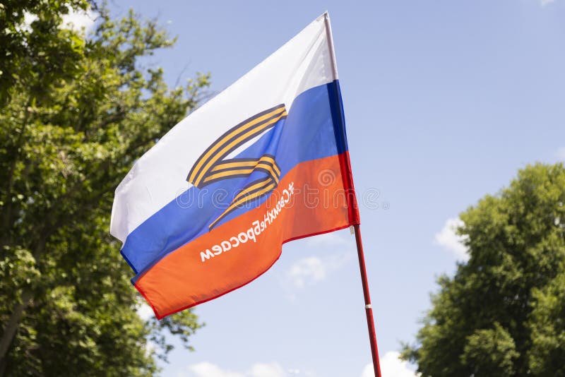 Flag of Russia with the Z Symbol on it on a Pole. Stock Photo - Image ...