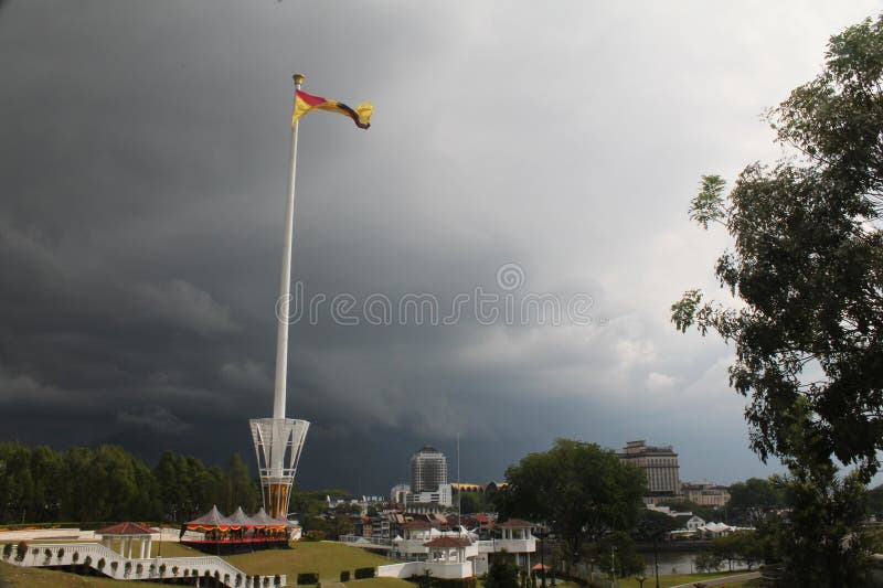 Flag of Sarawak, Malaysia, Flies in Front of Dark Brooding Skies Stock ...