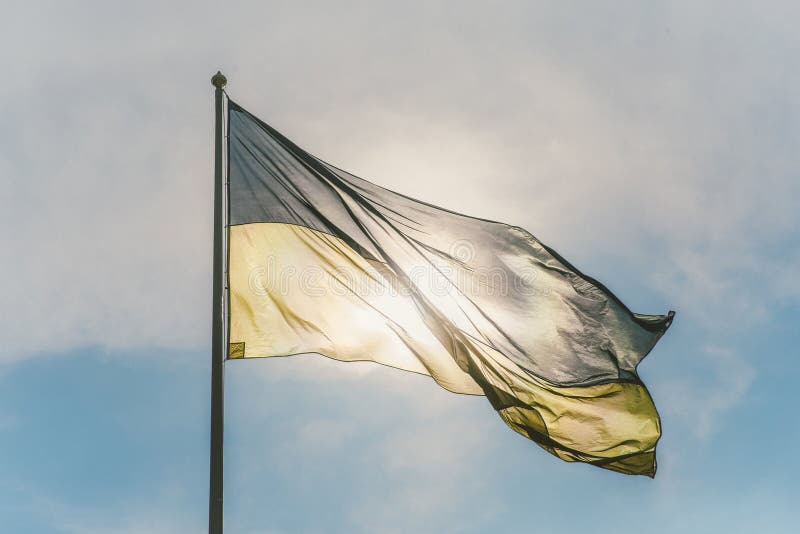 Flag of the Ukraine Against the Sun Stock Image - Image of ukraine ...