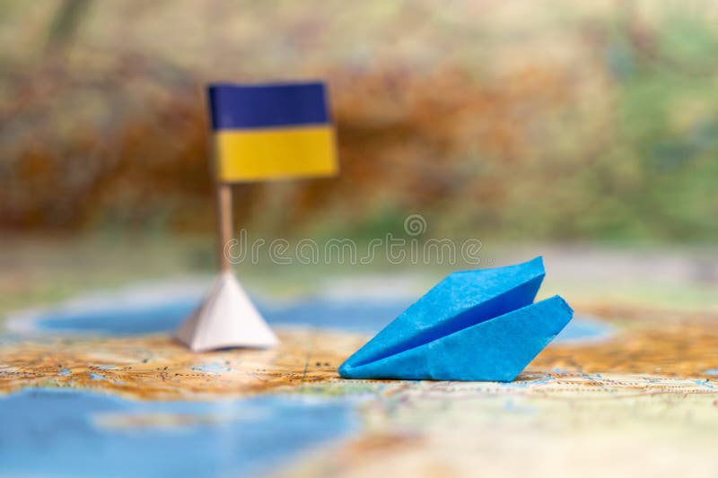 Flag of Ukraine on the Map and a Paper Airplane Stock Photo - Image of ...