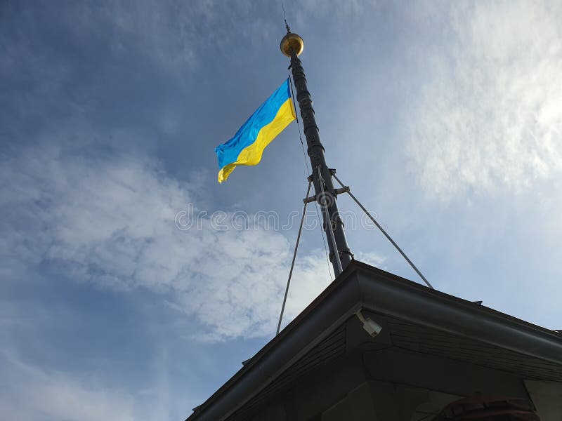 The Flag of Ukraine on the Municipality Building of Lviv Town Stock ...