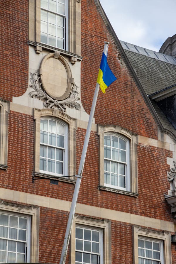 Flag of Ukraine on an Old Brick and Stone Building in England Stock ...