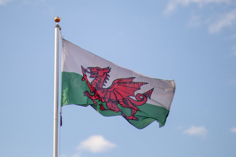 Flag of Wales with Blue Sky in the Background Stock Image - Image of ...