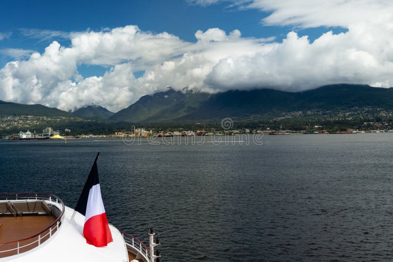 Flagging the Ocean, Mountains and Clouds, Vancouver, BC, Canada Stock ...