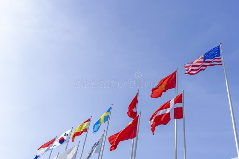Flagpole International Global with Blue Sky Background Stock Photo ...
