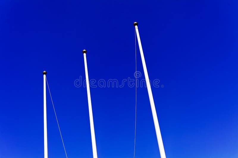 Three Empty Flag pole stock photo. Image of people, flagpole - 60789910
