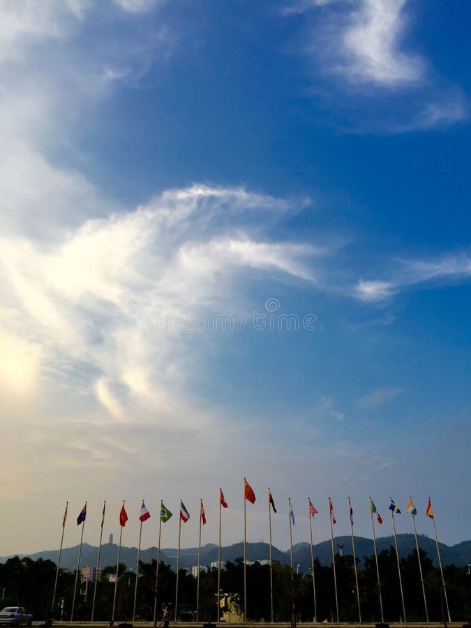 Flags in blue sky stock photo. Image of national, blue - 76693538