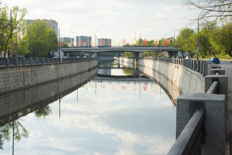 Flags on the bridge stock photo. Image of stone, buildings - 75247090