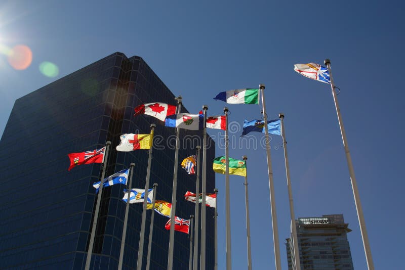 Flags with building stock image. Image of glass, artificial - 1156267