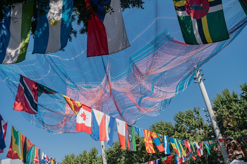 Flags of Different Countries Flutter in the Wind Against the Backdrop ...
