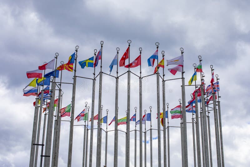 Flags of Different Countries Fluttering in the Wind, a Ring of National ...