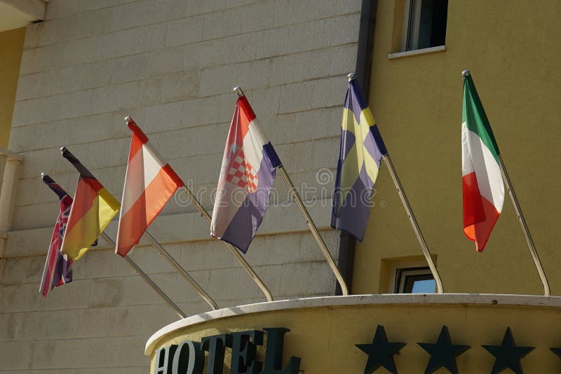 Flags of Different Countries Hang in Front of Hotel Stock Image - Image ...