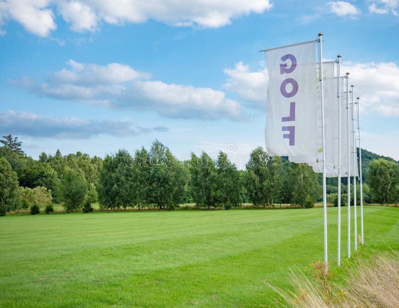 Flags at Driving Range for Practicing Golf Swing. Nice Landscape in ...