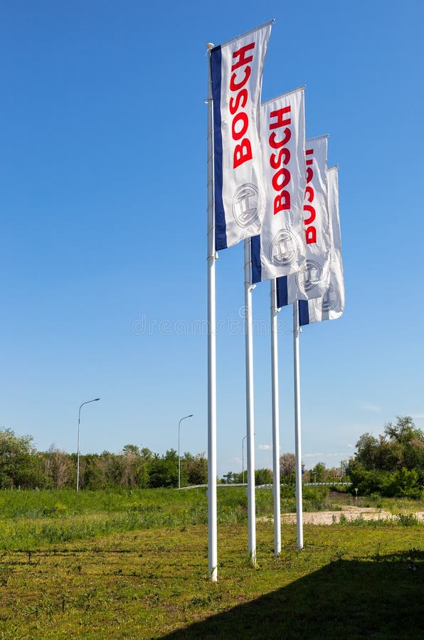 Flags with Emblem Bosch Against the Blue Sky Editorial Stock Photo ...