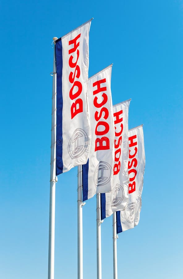 Flags with Emblem Bosch Against the Blue Sky Editorial Photography ...