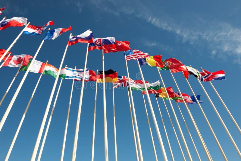 Flags on Flagpoles Fluttering in the Wind Stock Image - Image of blue ...