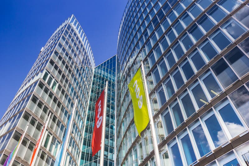 Flags in Front of a Modern Office Skyscraper in Essen Editorial Image ...