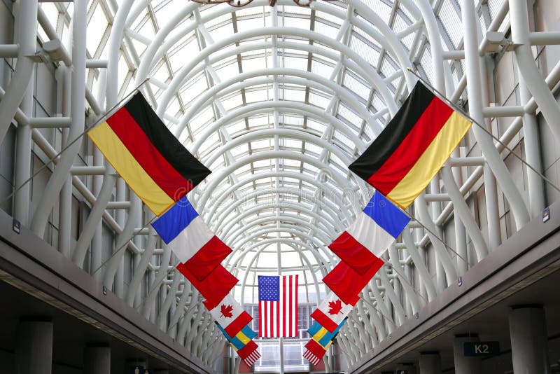 Flags in International Airport Stock Photo - Image of airline, flag ...