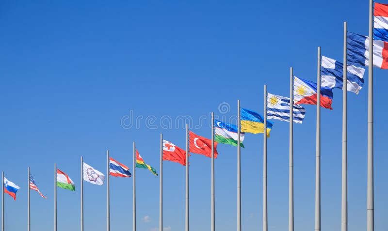Flags of Many Countries Flutter on the Background of the Blue Sky in ...