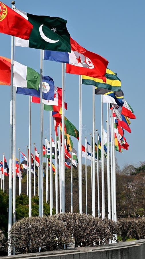 Flags of Multiple Countries Waving in the Wind Stock Photo - Image of ...