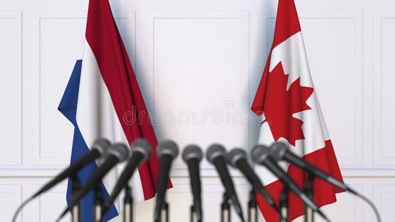 Flags of the Netherlands and Canada at International Meeting or ...