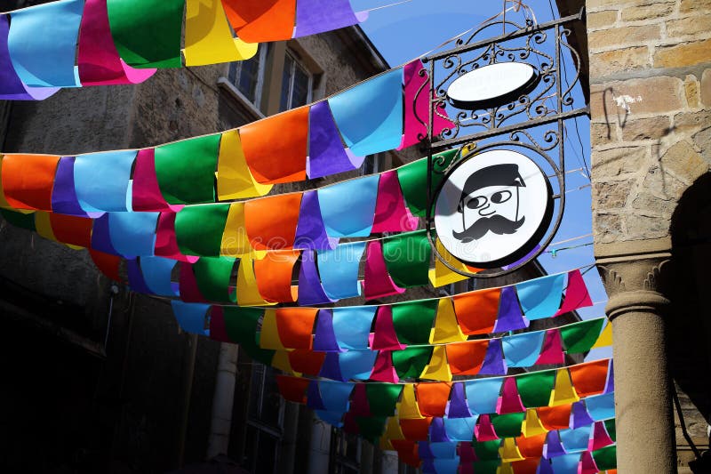 Flags over the street stock photo. Image of flag, festivities - 367307548