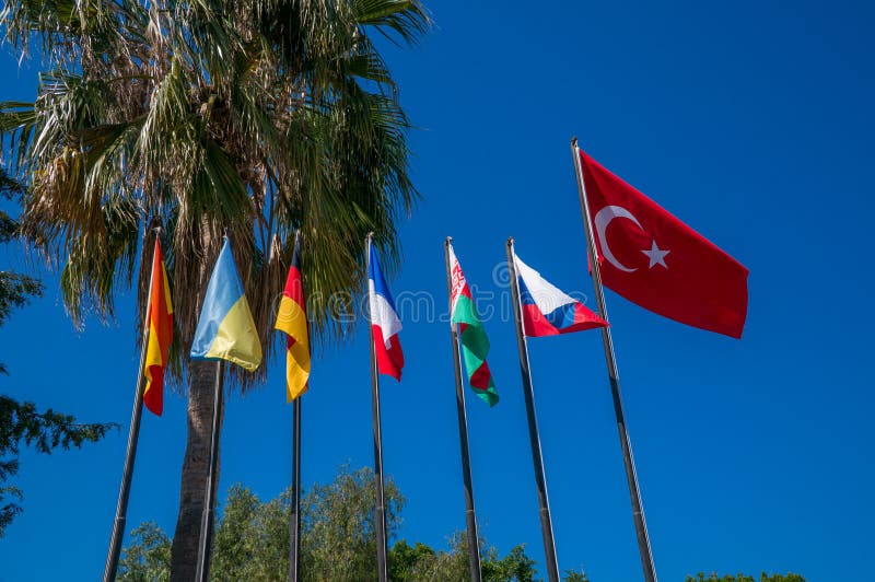 Flags of Several Countries Against the Blue Sky As a Symbol of Friendly ...