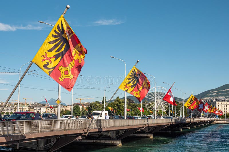 Flags of Switzerland and the City of Geneva on a Bridge in Geneva ...