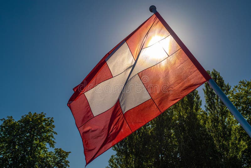 Flags of Switzerland and the City of Geneva on a Bridge in Geneva ...