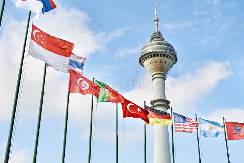 Flags and TV Tower on sky stock image. Image of view - 281741923