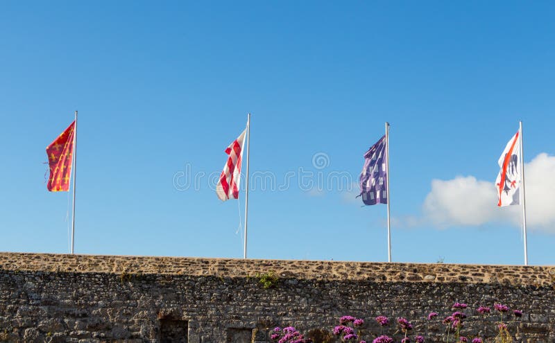 Flags on a Wall of Dinan Castle Stock Photo - Image of medieval, fort ...