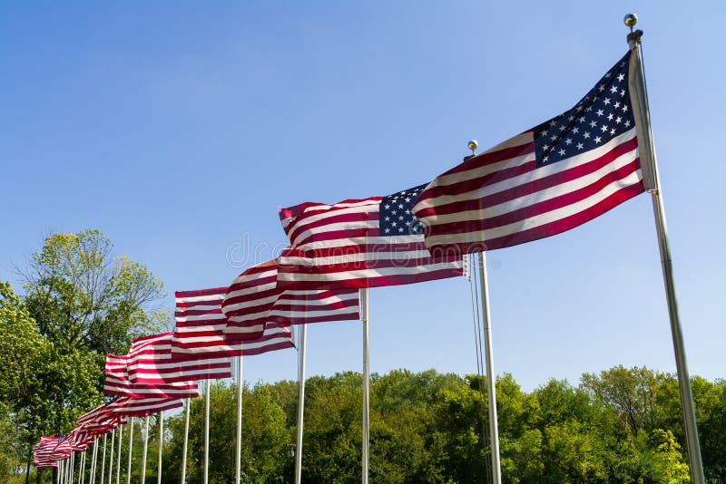 Flags waving in the wind. stock image. Image of patriotic - 76874185