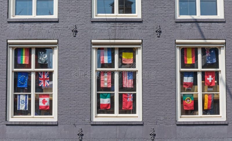 Flags in Windows stock photo. Image of flag, glass, flags - 158922546