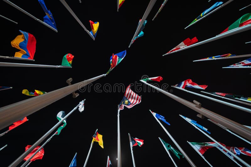 Night View of Flags from All Over the World Stock Photo - Image of ...