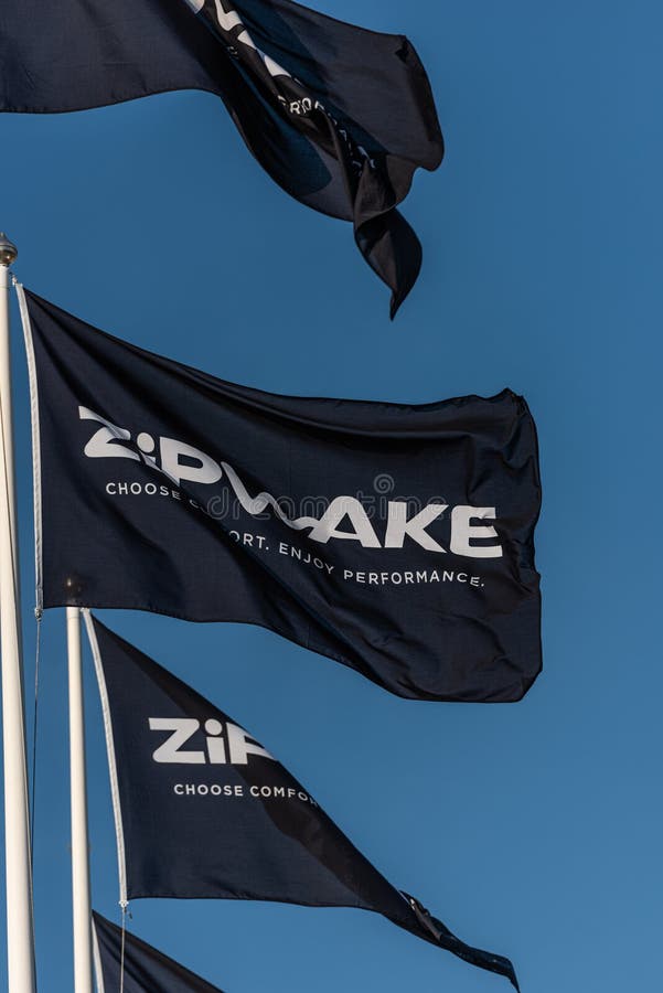 Flags with Zipwake logo.. editorial image. Image of artist - 290044815