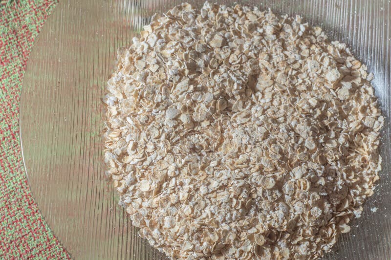 Flaked Oats, on a Plate that is on a Table with Natural Light,copy ...