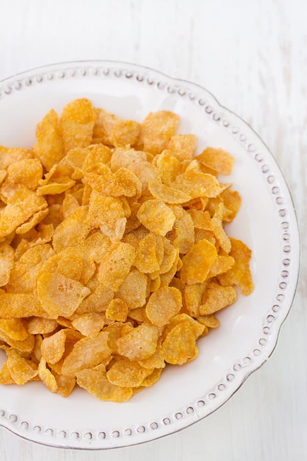 Flakes in white plate stock photo. Image of wooden, morning - 40893884