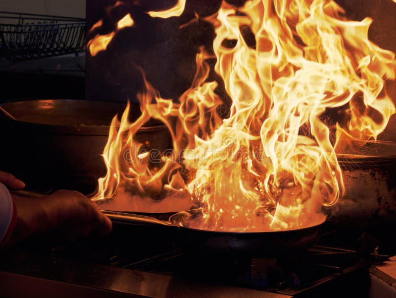 Flambe Chef Cooking in Outdoor Kitchen Stock Photo - Image of ...