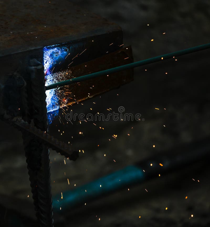 Flame of Fire and Sparks from Welding Metal at Night Stock Image ...