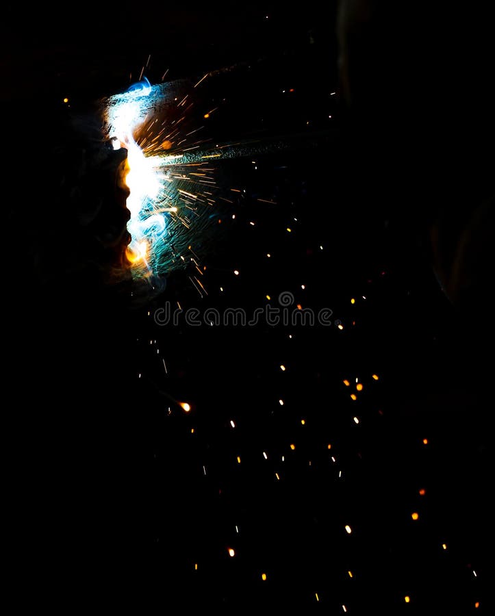 Flame of Fire and Sparks from Welding Metal at Night Stock Image ...
