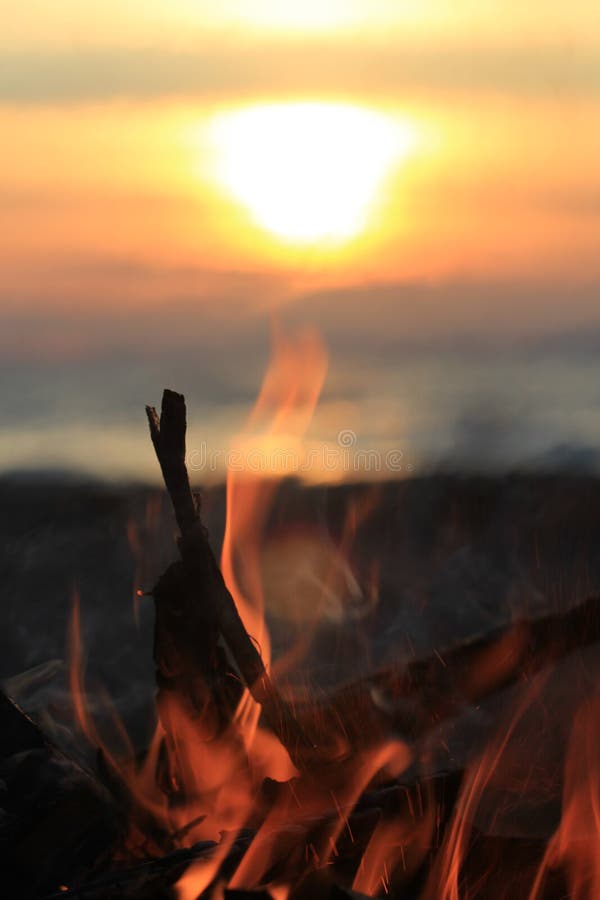 Flame of fire at sunset stock photo. Image of bonfire - 29989890